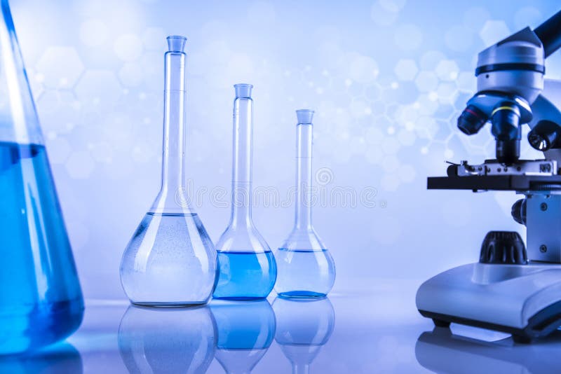 Laboratory Beakers,Science Experiment, Blue Background Stock Photo ...