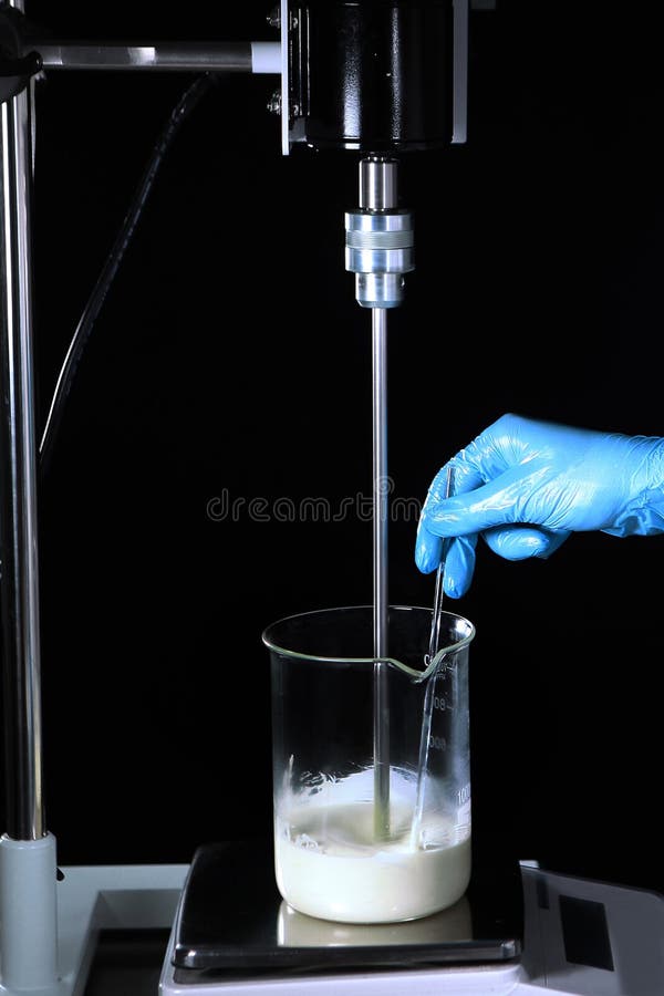 In the Laboratory, the Components for the New Cream are Mixed ...