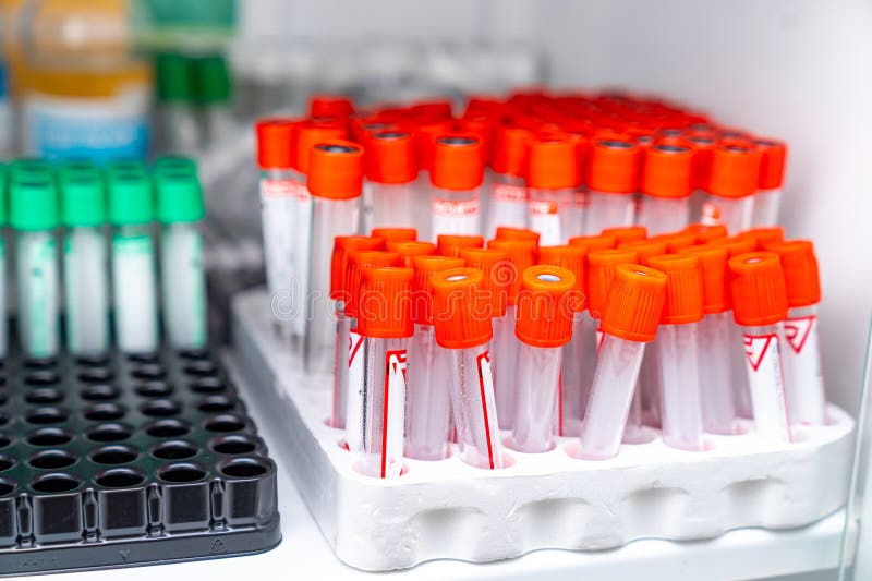 Laboratory Containers for Blood. Stack of Blood Test Tubes Stock Image ...