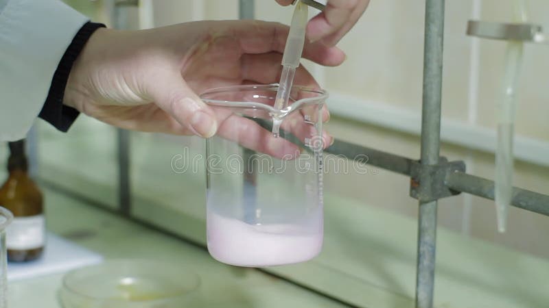 Milk Testing in Lab Flask. Food Quality Control. Analysis of Milk ...