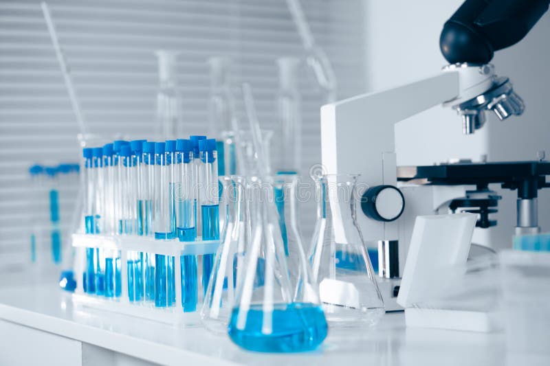 Laboratory Equipment Featuring Vibrant Blue Solutions, Essential ...