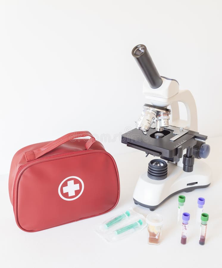 Laboratory Equipment and First Aid Kit. Microscope, Test Tubes with ...