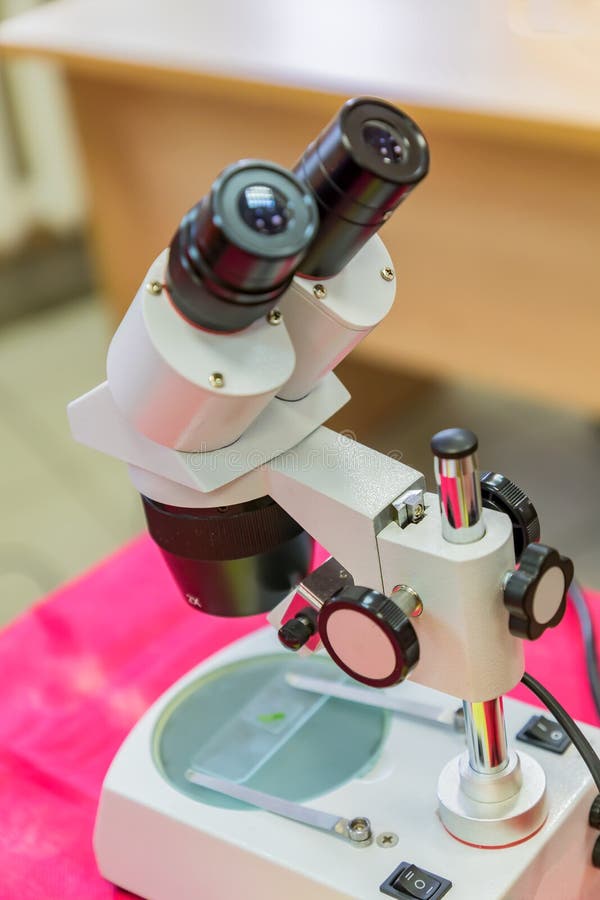 Laboratory Equipment, Optical Microscope for School Lessons on Red ...