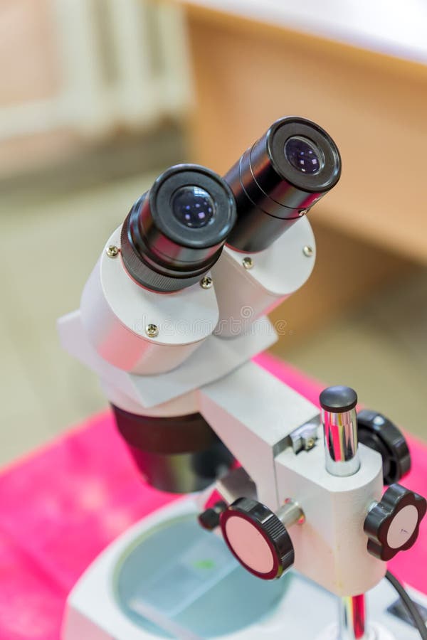 Laboratory Equipment, Optical Microscope for School Lessons on Red ...