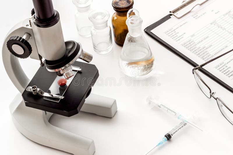 Laboratory Examination with Microscope. Equipment with Blood Sample on ...