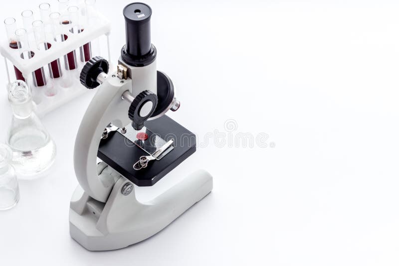 Laboratory Examination with Microscope. Equipment with Blood Sample on ...