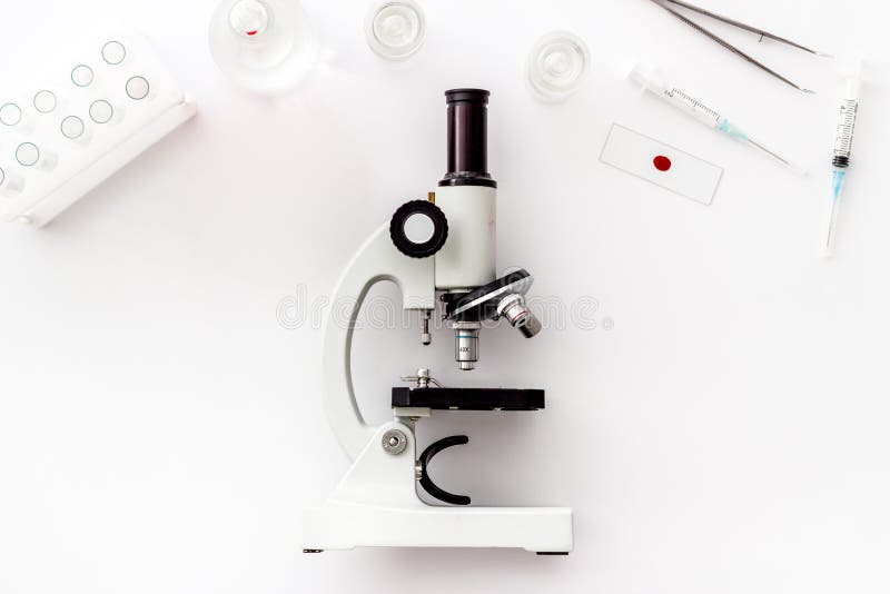 Laboratory Examination with Microscope. Equipment with Blood Sample on ...