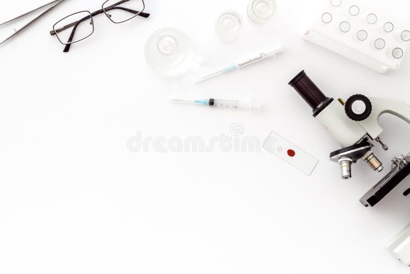 Laboratory Examination with Microscope. Equipment with Blood Sample on ...
