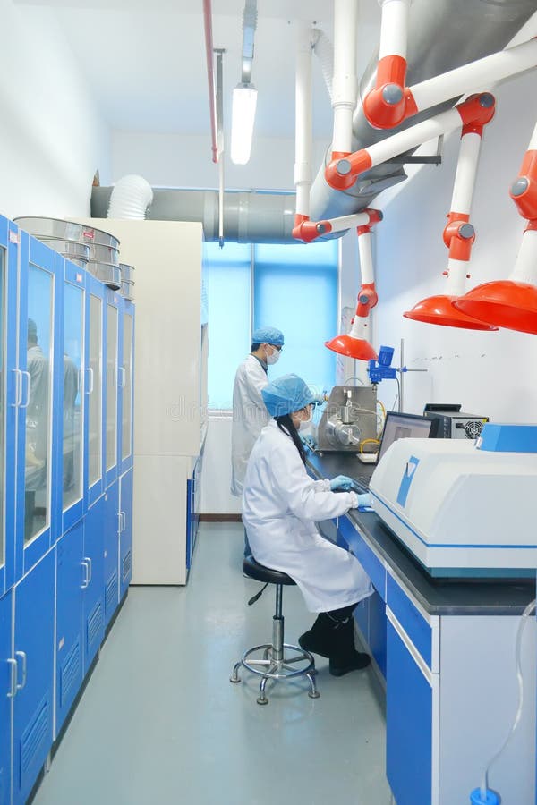 Two Femal Scientists Working Together Stock Photo - Image of looking ... Two Femal Scientists Working Together Stock Photo - Image of looking ...