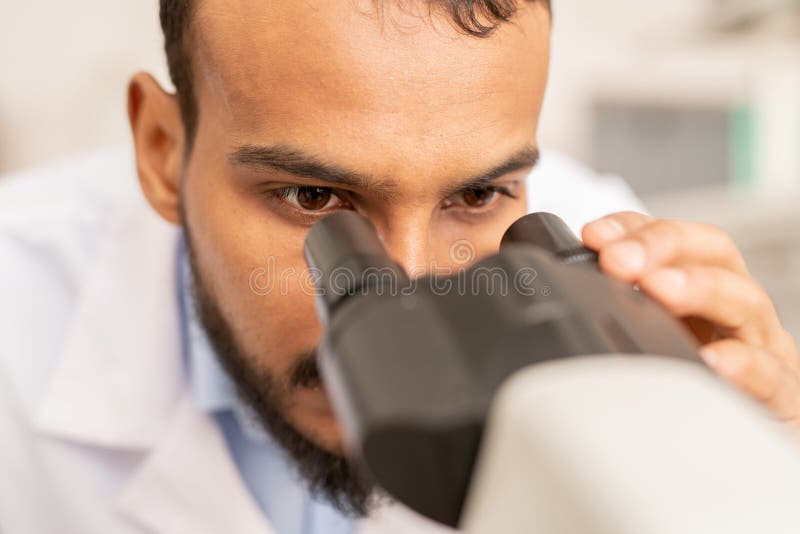 Laboratory Expert Looking in Microscope Stock Photo - Image of ...