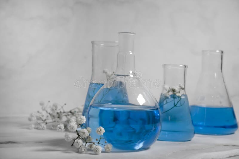 Laboratory Flask Flower Ingredient on a Light Background Extracting ...