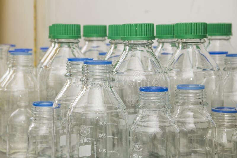 Laboratory Glass Flasks with Green Caps. Science Laboratory Stock Image ...