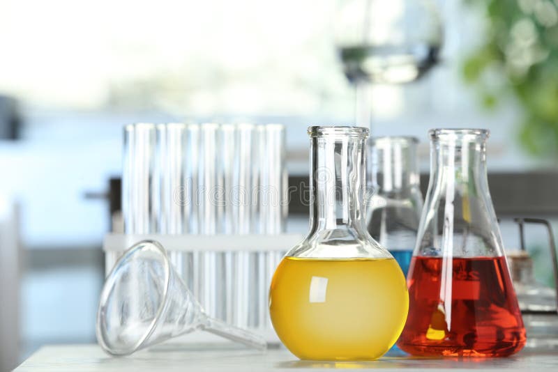 Laboratory Glassware with Different Liquid Samples Stock Image - Image ...