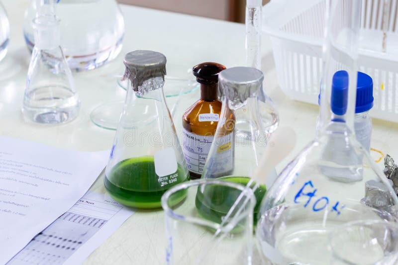 Laboratory Glassware with Green Liquid in a Science Research Laboratory ...