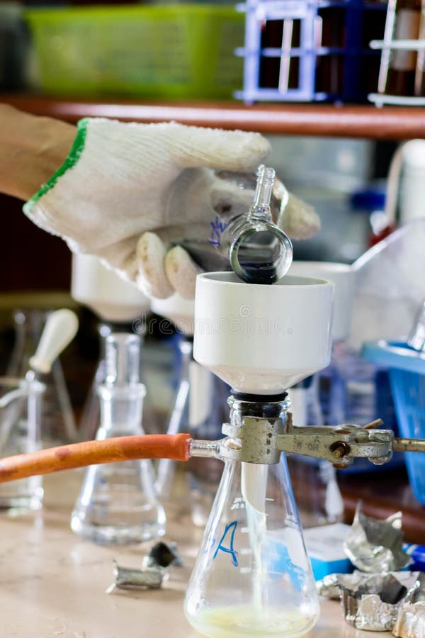 Laboratory Glassware with Green Liquid in a Science Research Laboratory ...