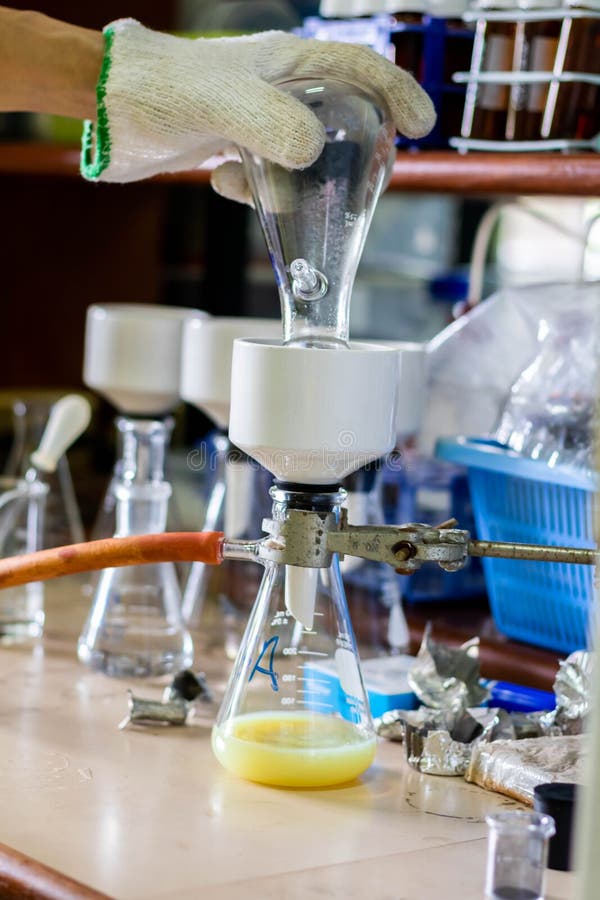 Laboratory Glassware with Green Liquid in a Science Research Laboratory ...