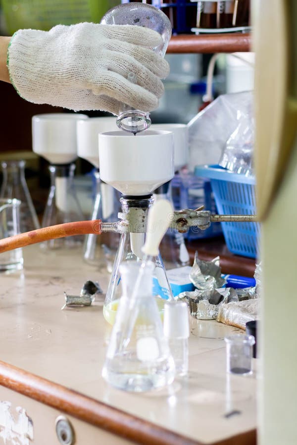 Laboratory Glassware with Green Liquid in a Science Research Laboratory ...