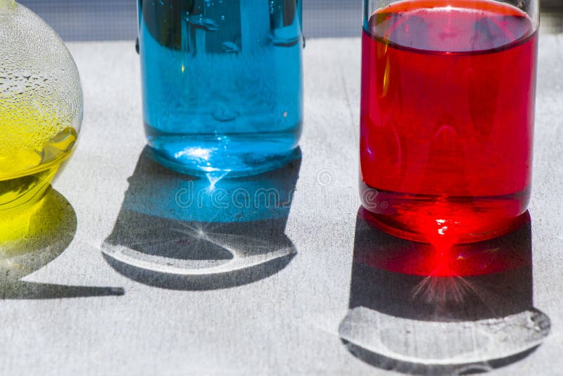 Laboratory Glassware with Red and Blue Color Reagents Stock Photo ...