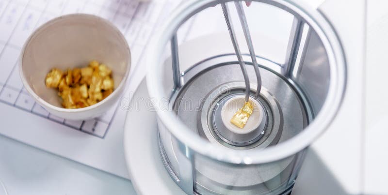 Gold in laboratory glass stock photo. Image of biology - 11398636