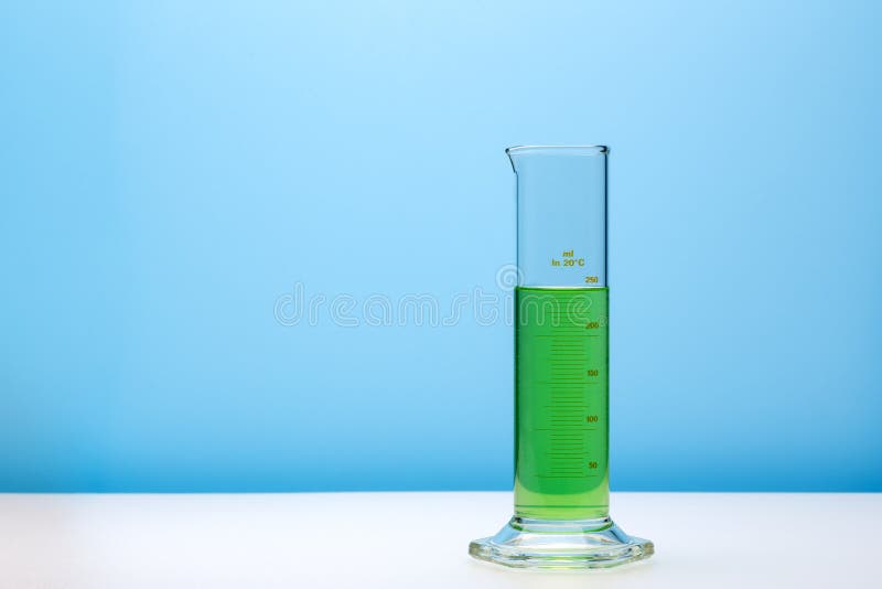 Laboratory Graduated Cylinder with Green Liquid. Copy Space Stock Image ...