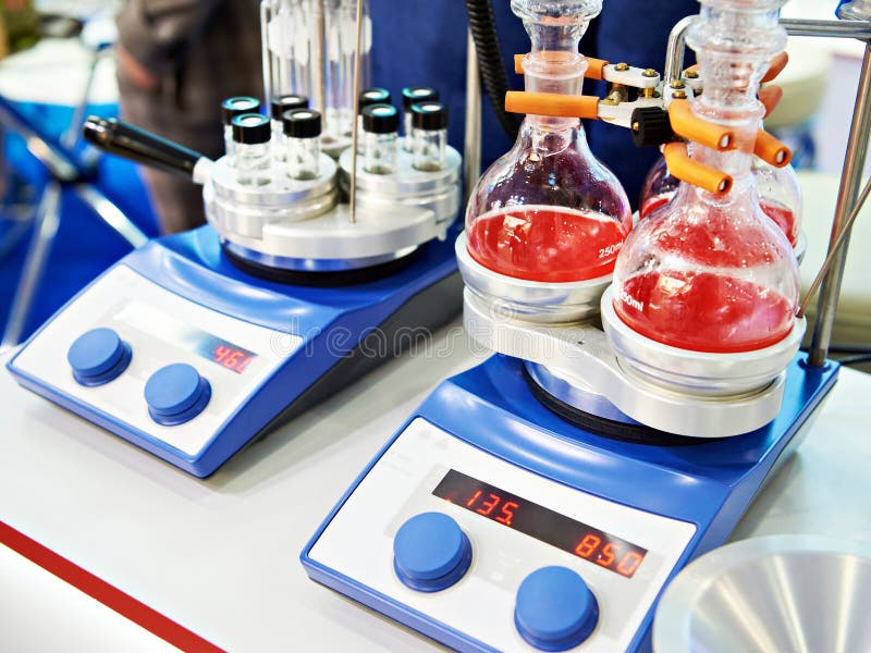 Laboratory Heating Stove Plate with Flasks in Sand Stock Image - Image ...