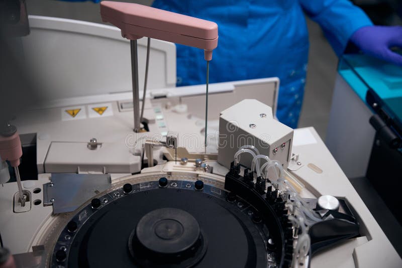 Laboratory Immunologist Uses Device for Automatic Isolation of Nucleic ...