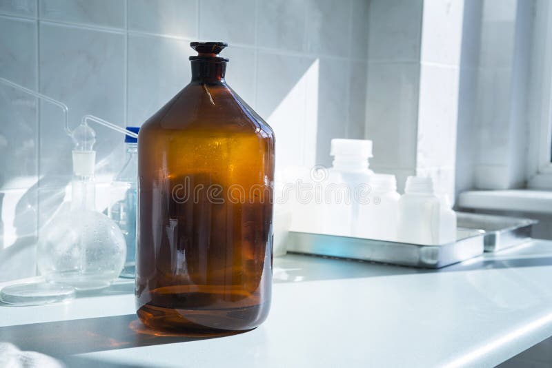 Laboratory Large Bottle on Table in Laboratory. Stock Image - Image of ...