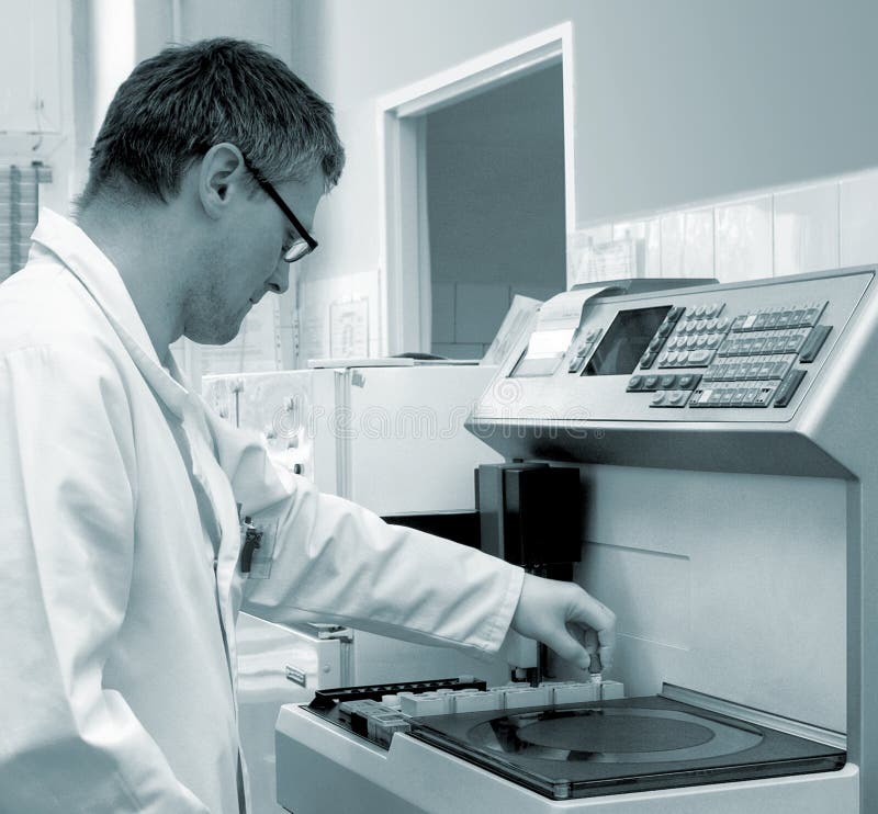 Laboratory man and machine stock image. Image of analyse - 2335391