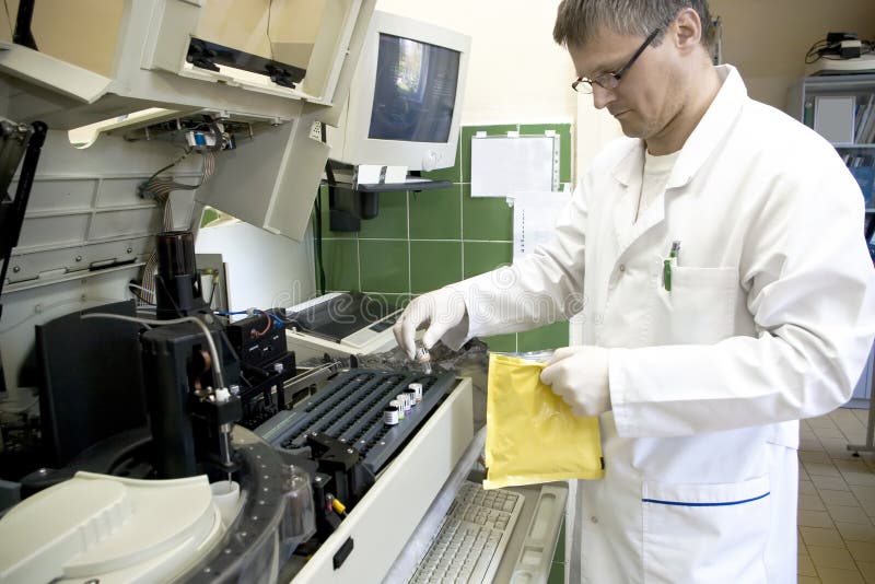 Laboratory man and machine stock photo. Image of hospital - 4085664