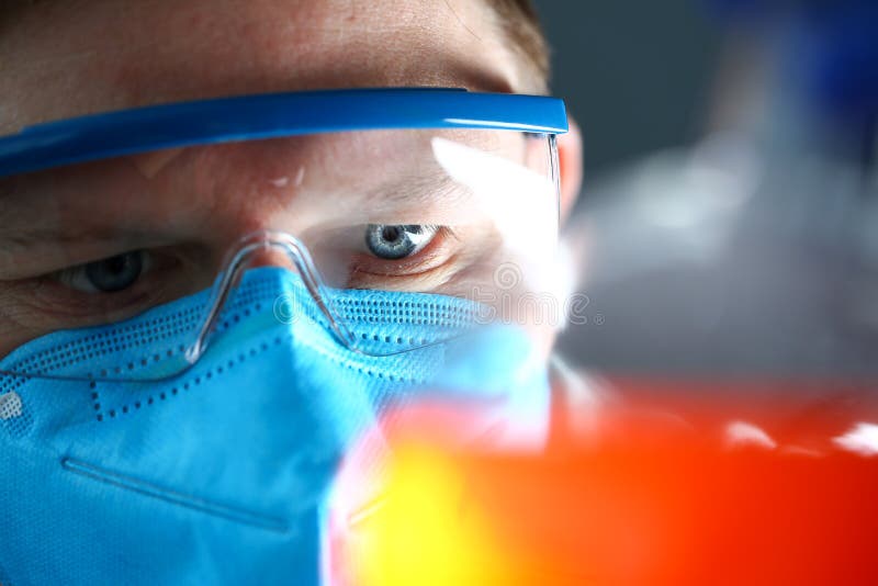 Laboratory Man Wearing Protective Mask Hold in Hand Test Sample Stock ...