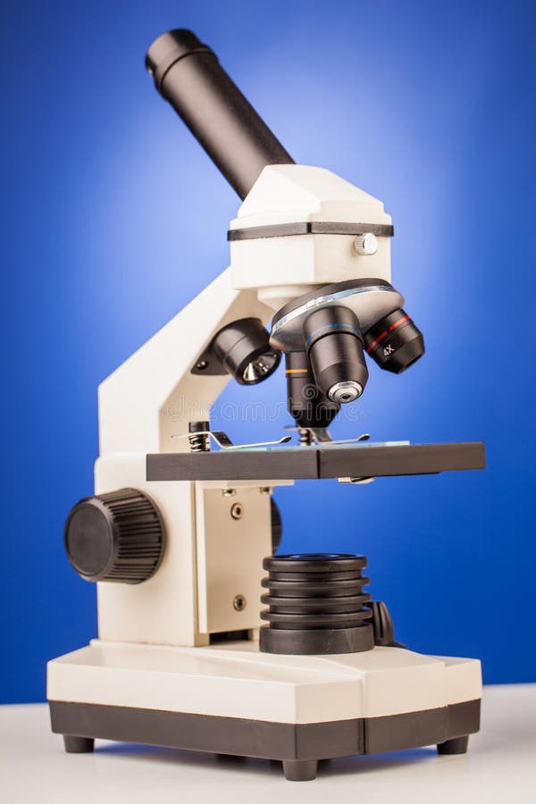 Laboratory Microscope and Blue Background Stock Image - Image of ...