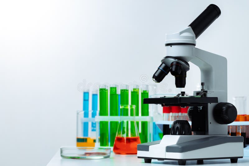 Laboratory Microscope with Colorful Test Tubes Close Up Stock Photo ...
