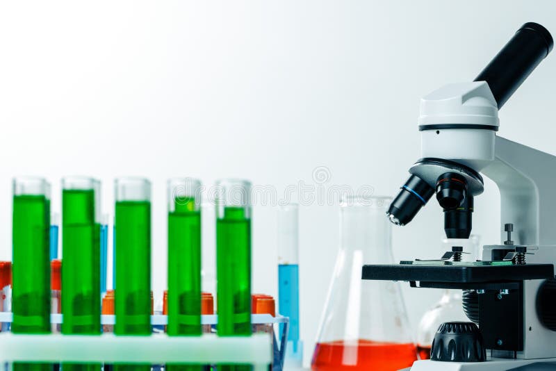 Laboratory Microscope with Colorful Test Tubes Close Up Stock Image ...