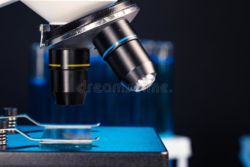 Microscope with Lenses Close Up Against Dark Background Stock Image ...