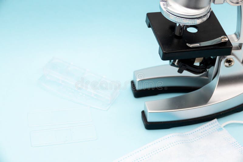 Laboratory Microscope Scientific CoVID-19 Research on Blue Background ...