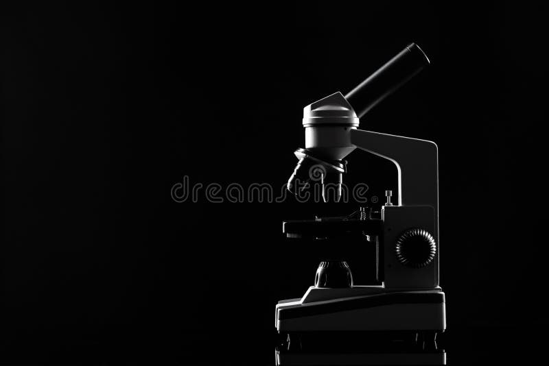 Laboratory Microscope on Table in the Dark Stock Image - Image of ...