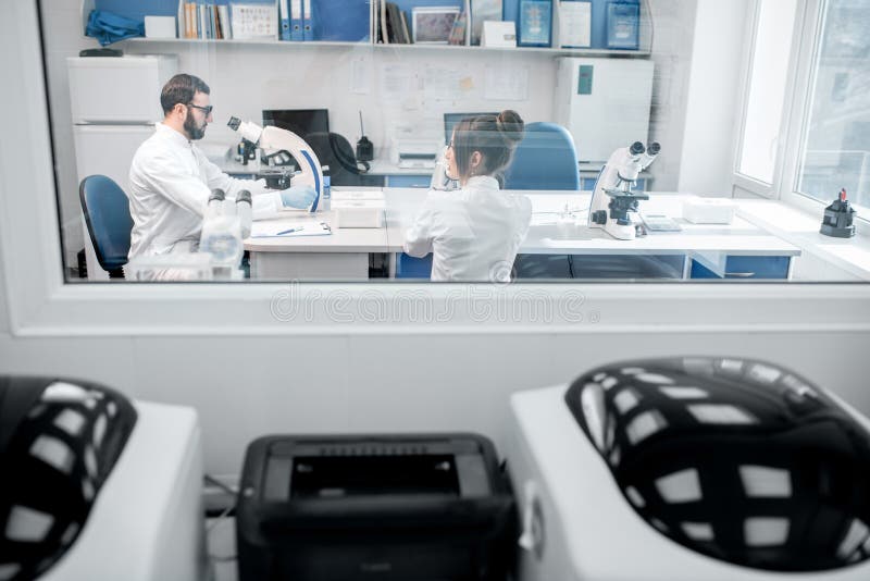 Laboratory Office with Medics and Microscopes Stock Image - Image of ...