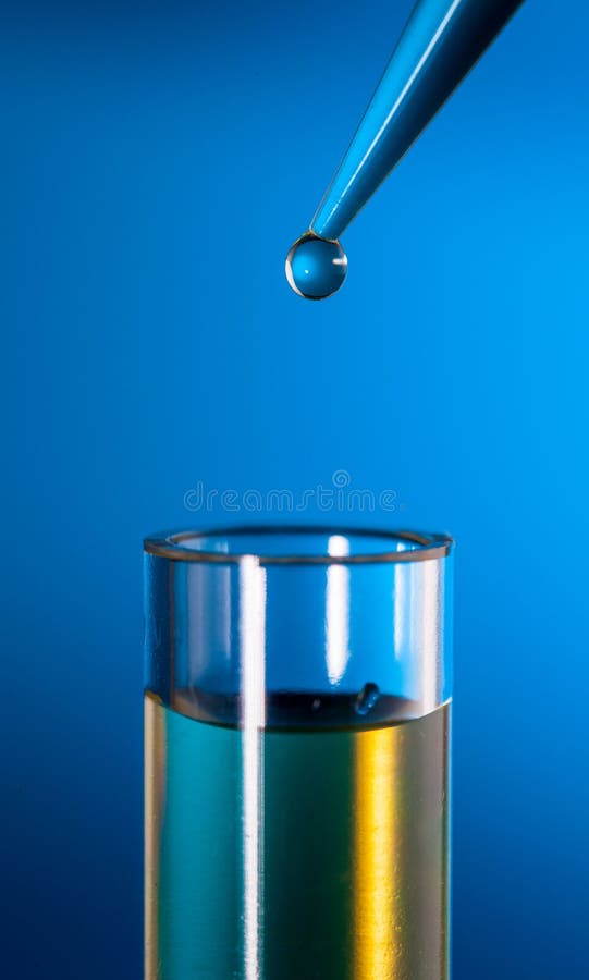 Pipette with Drop of Liquid Stock Photo - Image of laboratory ...