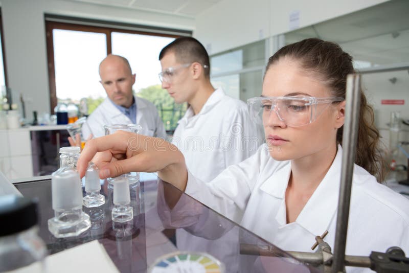 Laboratory Researchers Perform Tests Stock Photo - Image of male ...