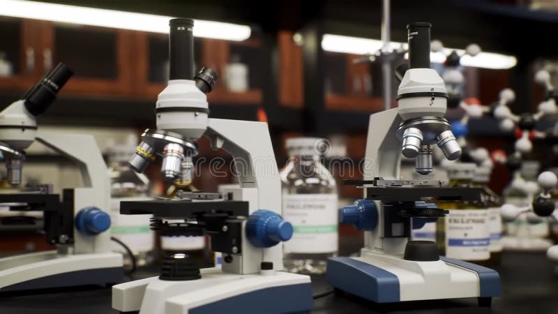Laboratory Scene Featuring Multiple Microscopes on a Workbench, with ...