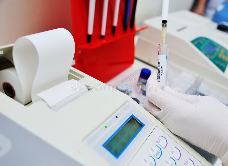 A Laboratory Scientist with a Dispenser in His Hands Conducts ...