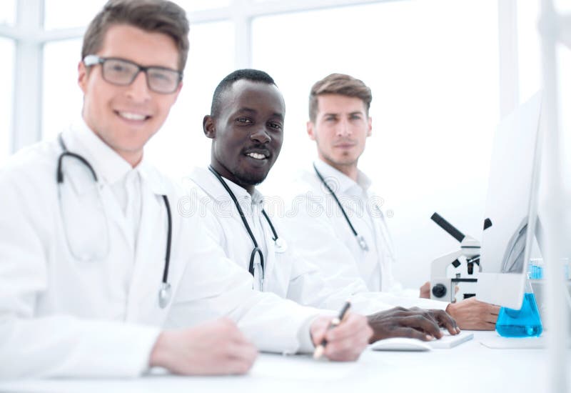 Laboratory Staff Sitting at the Desk Stock Photo - Image of care ...