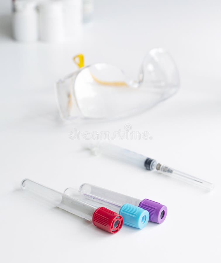 Laboratory Table for a Blood Test. Test Tube Glasses Syringe on a White ...