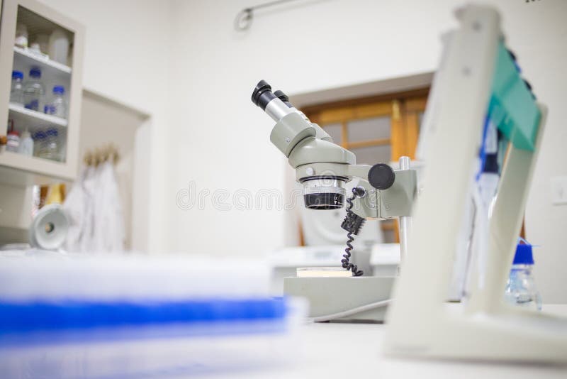 Laboratory Table with a Microscope for Testing DNA Stock Image - Image ...