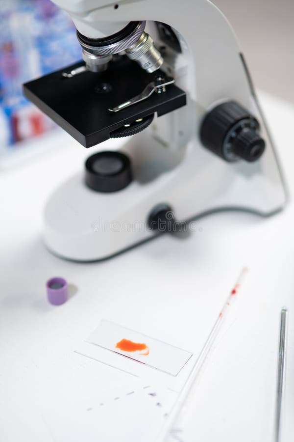 Microscope with Test Tubes on a Laboratory Bench Stock Photo - Image of ...
