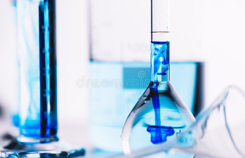 Laboratory Equipment with Blue Liquid Inside on White Background Stock ...