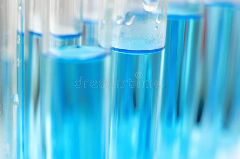 Laboratory Test Tubes with Blue Liquid, Selective Focus. Scientific ...