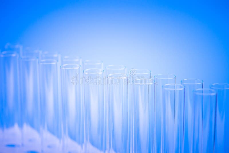 Glass Test Tubes in a Stand on Blue Background Stock Photo - Image of ...