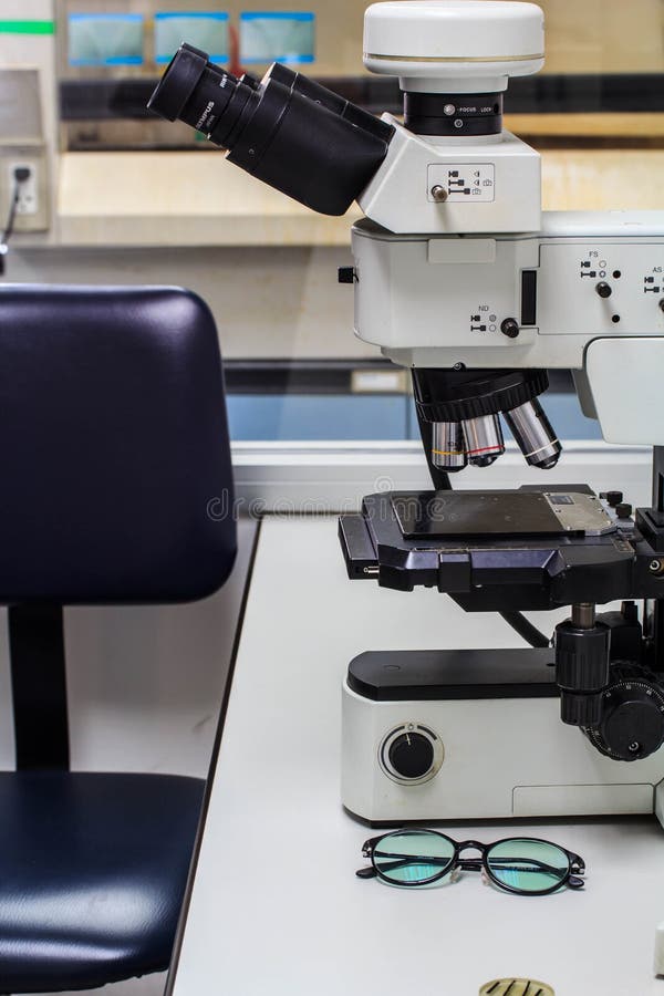Laboratory Using a Microscope Stock Image - Image of scientist, element ...