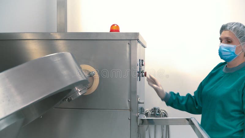 Laboratory Worker Adjust Pharmaceutical Machine for Mixing Powder and ...